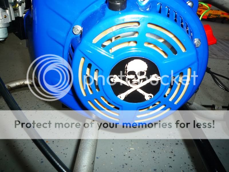 Tach and new pull start cover decal installed on the Manco kart | OldMiniBikes.com